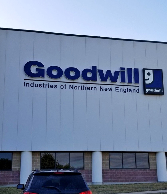 Goodwill's treasure trove awaits! This no-frills exterior hides a bargain hunter's paradise where every pound counts. Who knew dumpster diving could be so glamorous?