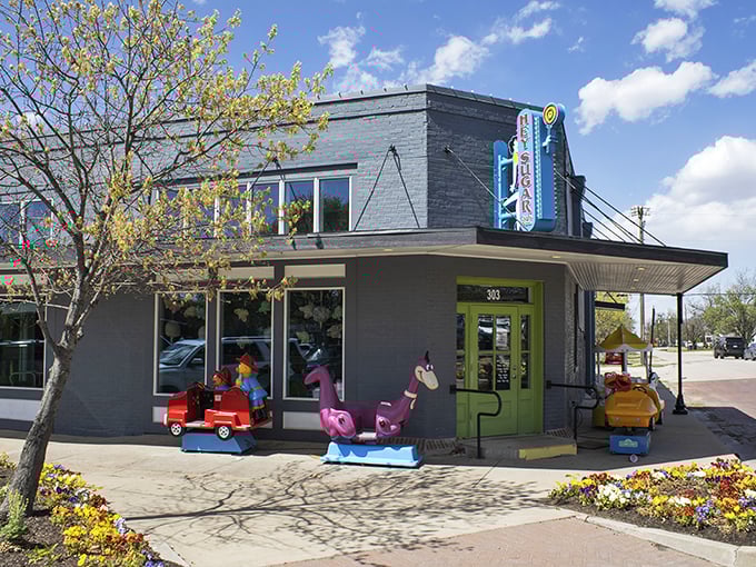 Hey Sugar's storefront is like a Wes Anderson set come to life – whimsical, colorful, and practically begging you to indulge your inner child.