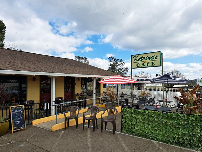 Katrina's Caf&eacute;: Where breakfast dreams come true! Striped umbrellas and sunny vibes invite you to start your day with a smile and a stack of pancakes.