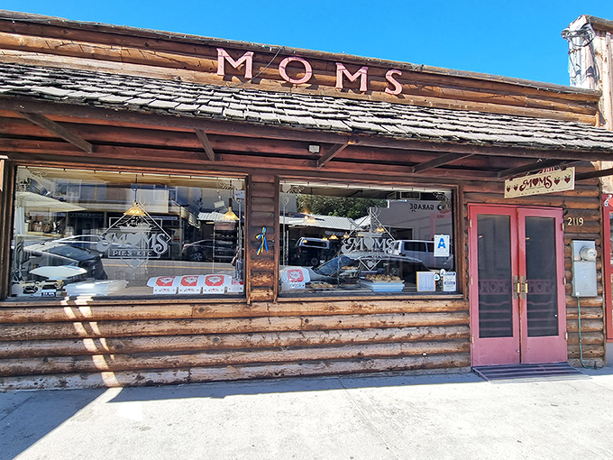 Mom's Pie House: Where patriotism meets pastry! This log cabin of deliciousness is like a Norman Rockwell painting come to life.