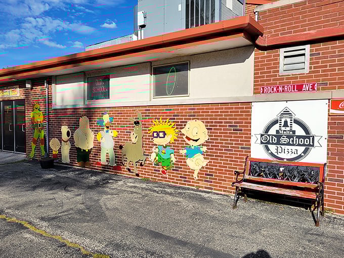 Old School Pizza: Where cartoon characters and rock 'n' roll collide! This pizzeria's exterior is a nostalgic feast for the eyes.