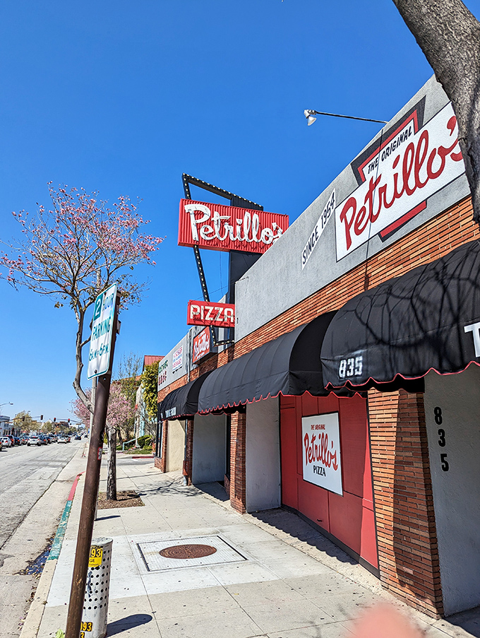Petrillo's Pizza: Where time stands still, but the pizza keeps coming! That neon sign's been beckoning hungry folks since Eisenhower was in office.