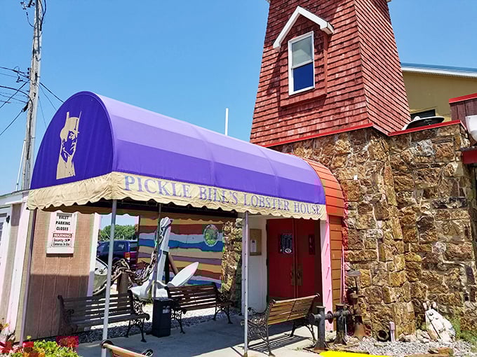 Ahoy, seafood lovers! Pickle Bill's Lobster House looks like a nautical theme park for your taste buds. That purple awning is more inviting than a siren's song!