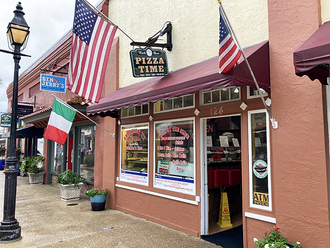 Stars, stripes, and slices! Pizza Time's patriotic facade promises a taste of the American Dream, one cheesy bite at a time.