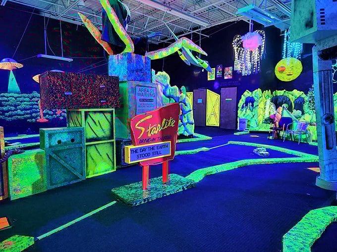 Space Golf: Where E.T. meets Eagle! This cosmic course is like stepping into a black light poster come to life.