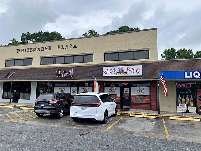 Wiley's Championship BBQ: Where the pig on the sign grins wider than you will after tasting their ribs. A smoky slice of heaven in Savannah!