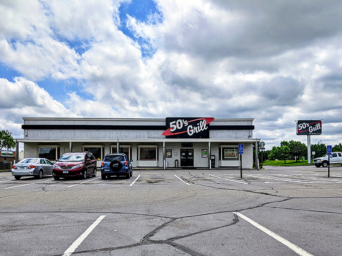 Chrome dreams and neon gleams! 50's Grill's parking lot is a classic car show waiting to happen. Time to cruise down memory lane!