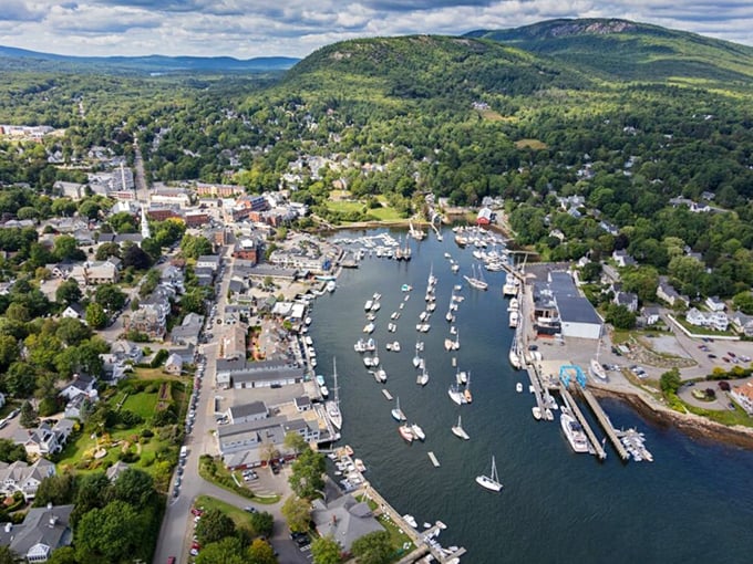Main Street meets maritime charm. Camden's colorful shops and bobbing boats create a Norman Rockwell painting come to life.
