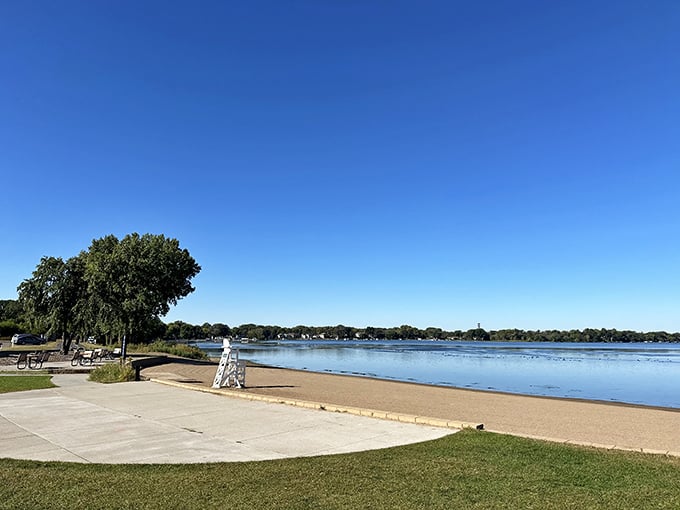 Sunbathers and sailors unite! This pristine beach offers the perfect blend of relaxation and adventure on Medicine Lake's sparkling waters.