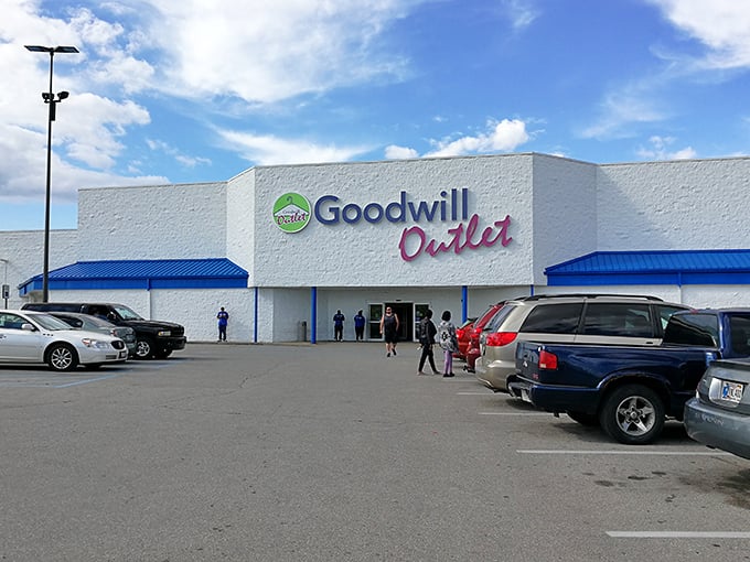 Blue bins of possibility await! It's like archaeological digging, but instead of dinosaur bones, you might find vintage Levi's.