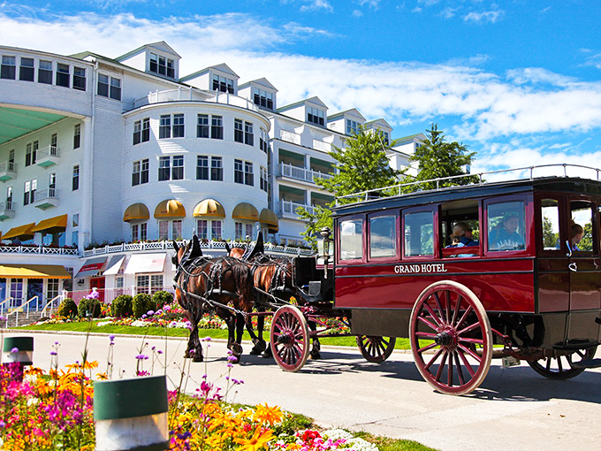 Horse-drawn elegance meets Victorian splendor. The Grand Hotel's timeless charm whisks you away to a bygone era of grace and grandeur.