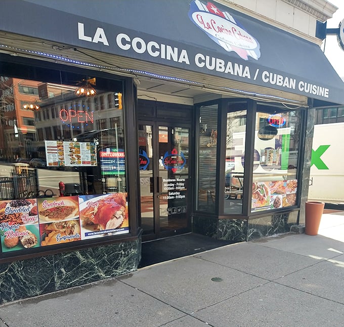 Sandwich heaven alert! La Cocina Cubana's window display is like a Cuban food mood board, tempting passersby with colorful, mouthwatering creations.