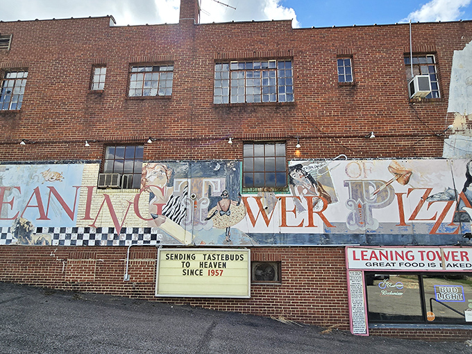 Sending tastebuds to heaven since 1957? That's a lot of celestial pizza deliveries! The mural adds a slice of whimsy.