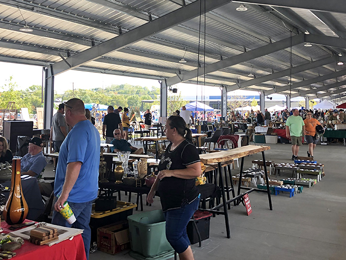 The market's vast interior feels like a treasure map come to life, with vendors displaying their wares under industrial-chic beams.