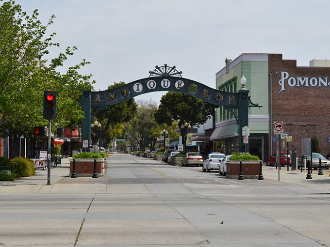 Antique Row's iconic arch welcomes you to a world of vintage treasures. It's like a time machine, but with better shopping!