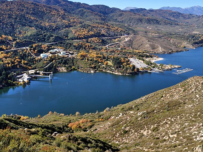 Mountain-framed perfection: Silverwood Lake's crystal waters reflect the rugged peaks like a giant natural mirror.