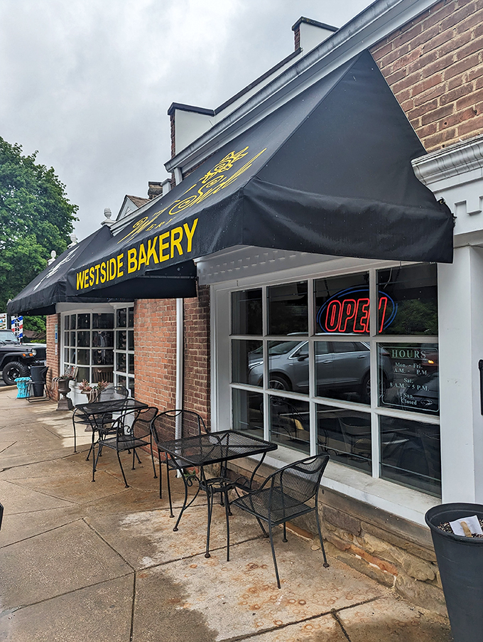 Outdoor seating at a bakery? Genius! It's like a front-row seat to the greatest show on earth, starring pastries as the lead actors.