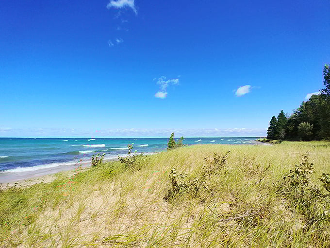 Postcard-perfect doesn't do it justice. This pristine shoreline is Mother Nature's masterpiece, complete with a grass-trimmed sandy frame.