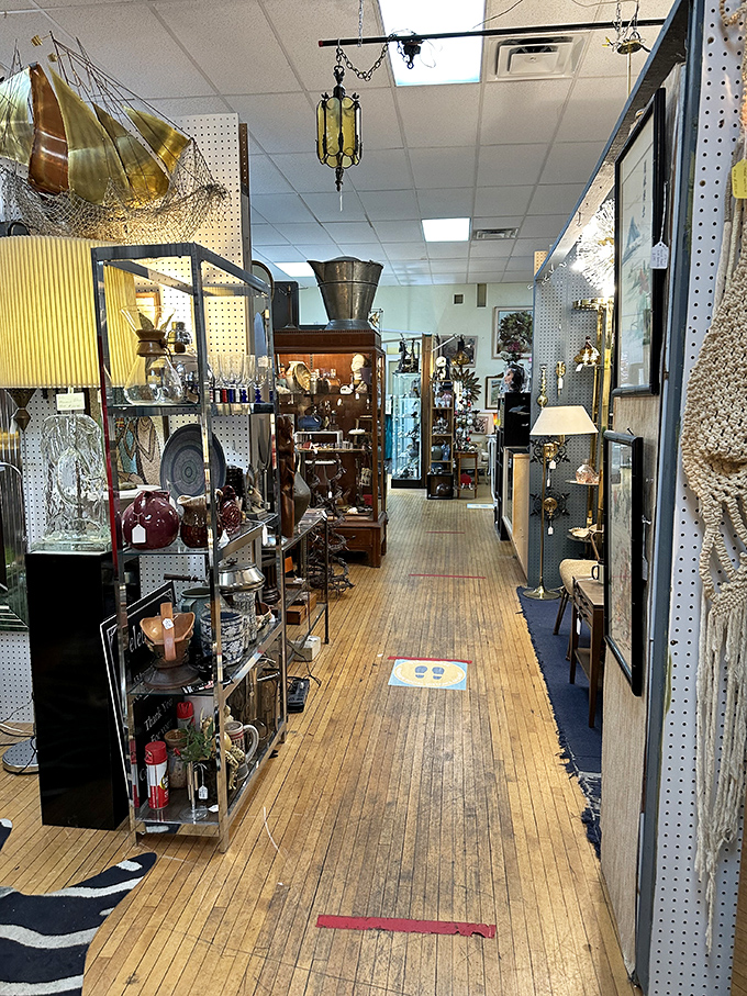 Welcome to the labyrinth of nostalgia! This narrow aisle is your yellow brick road to treasures that would make even Indiana Jones do a double-take.