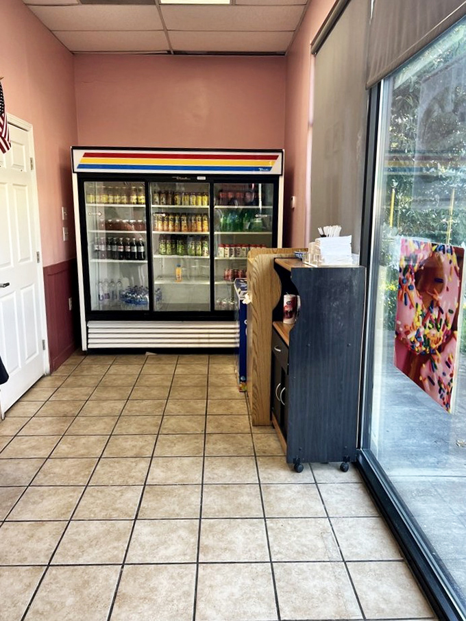 Step into a world where pink walls and the aroma of fresh donuts collide. It's like Willy Wonka opened a cozy caf&eacute;!