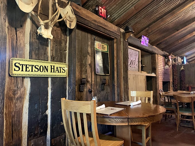 Step into a time machine of taste. This interior screams "cowboy chic" with a side of mouthwatering anticipation.