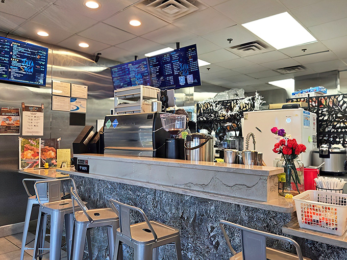 Step into flavor town! This sleek counter is where coffee wizardry meets crispy chicken magic. It's like a culinary command center for deliciousness.