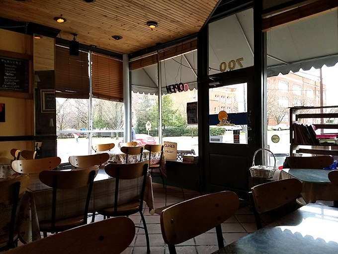 Wooden ceilings, mismatched chairs, and sunlight streaming in - it's like your cool aunt's living room, but with better food.