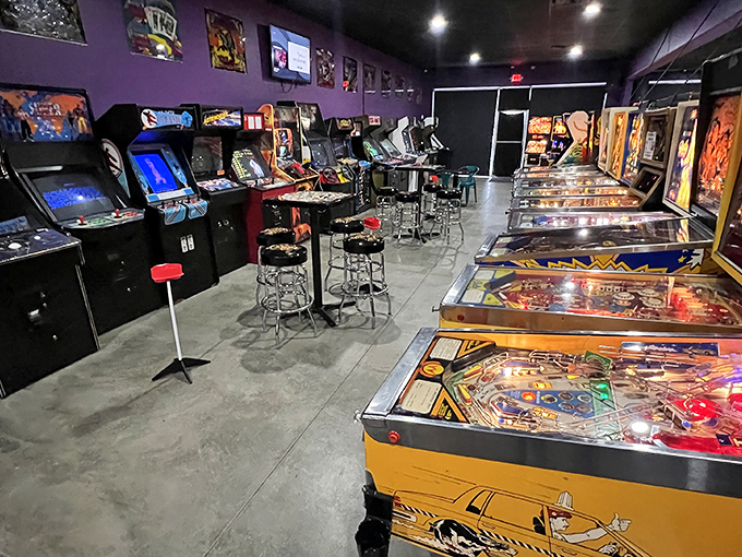 Step inside and let the purple haze of nostalgia wash over you. This isn't just an arcade; it's a time machine with joysticks.