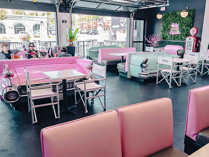 Hop in, time travelers! Frisco's interior is a pastel paradise where every booth is a DeLorean ready to whisk you back to the fabulous fifties.