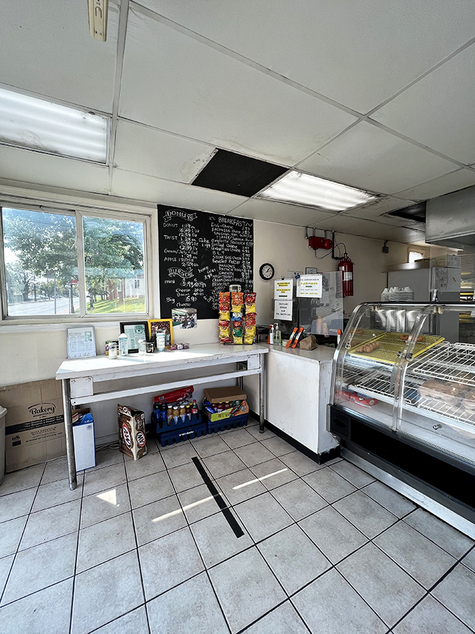 Step into a time machine of taste! This no-frills interior might not win design awards, but the chalkboard menu promises a journey through donut nirvana.