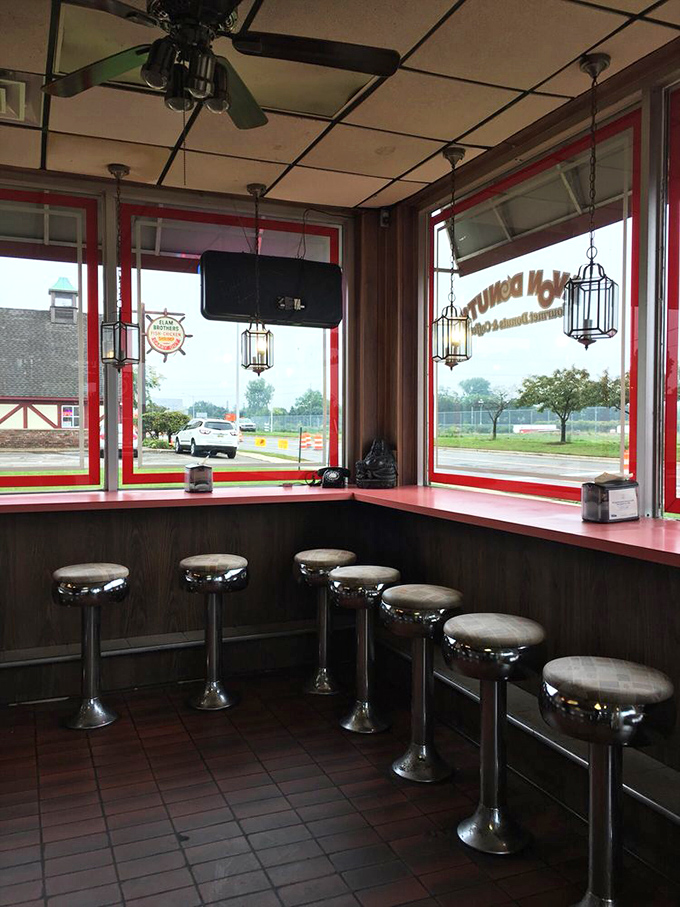 Step into a time machine of taste! Chrome stools and cozy corners invite you to linger over life's sweetest moments.