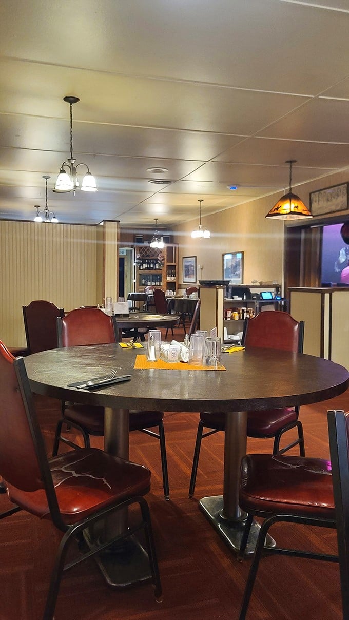 Step into a time capsule of comfort. This cozy dining room whispers tales of countless satisfying meals shared.