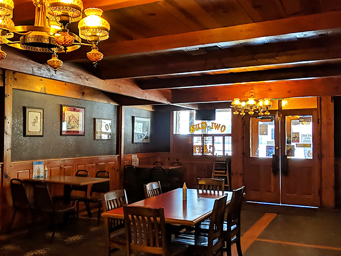 Step into a time capsule of comfort! The Owl Club's interior whispers tales of countless satisfied diners and unforgettable meals shared.