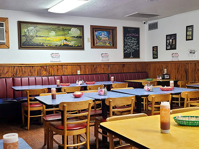 Step into a time capsule of coastal charm. The wood-paneled walls and vintage artwork transport you to a simpler era of good food and even better company.