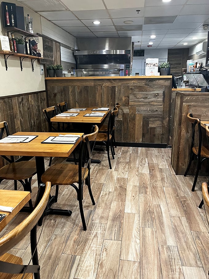 Rustic charm meets pizza perfection. This cozy nook could be the set of a Nora Ephron rom-com about finding love over a slice.