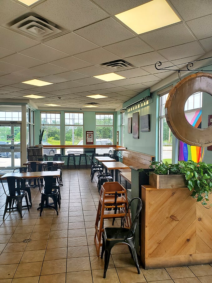 Step into donut paradise! With its cozy seating and warm lighting, this interior feels like your coolest friend's living room &ndash; if that friend was a donut wizard.