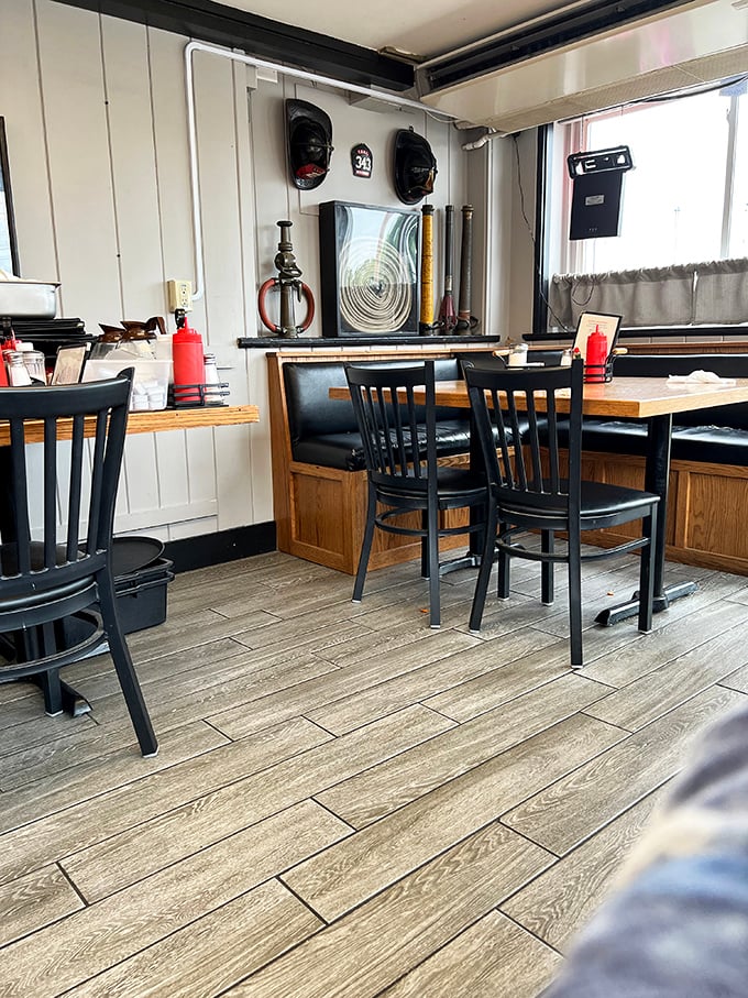 Step inside and you're greeted by a cozy time capsule. It's like your favorite aunt's kitchen got a firefighter makeover.