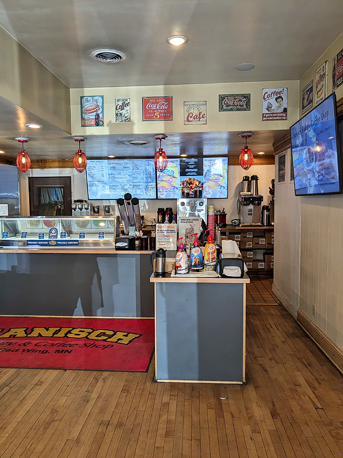 Step into sugar paradise! Retro Coca-Cola signs and warm lighting create an atmosphere as inviting as the aroma of fresh-baked goods.