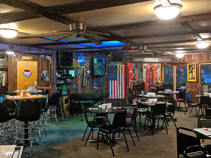 Americana overload! This dining room is like your quirky uncle's man cave met a patriotic yard sale &ndash; and somehow, it works beautifully.