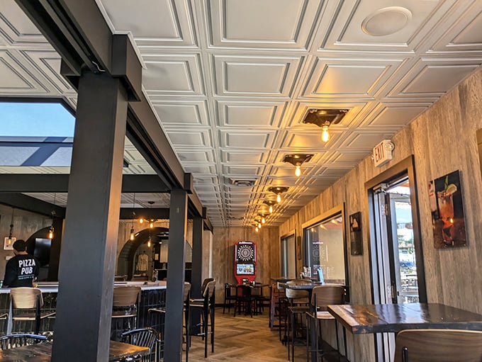 Step into a slice of pizza paradise! The modern rustic interior, with its chic ceiling and cozy booths, sets the stage for unforgettable culinary adventures.