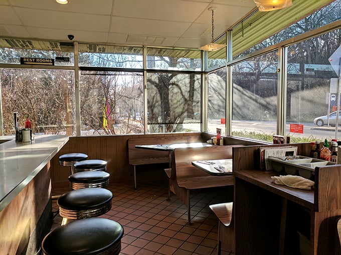 Slide into a booth and feel the nostalgia wash over you. This isn't just a meal; it's a front-row seat to the greatest show on earth: life in a classic American diner.