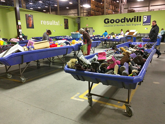 Welcome to the land of endless possibilities! Blue bins stretch as far as the eye can see, each one a potential goldmine of secondhand treasures.