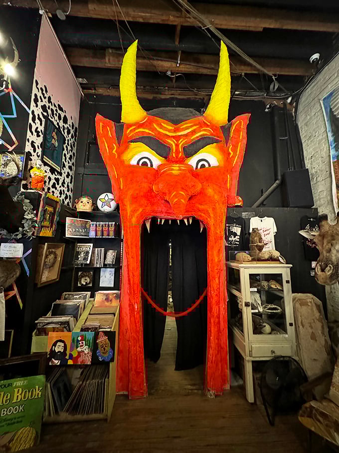 Talk about a jaw-dropping welcome! This fiery devil's maw isn't just an entrance; it's an invitation to embrace your inner oddball.