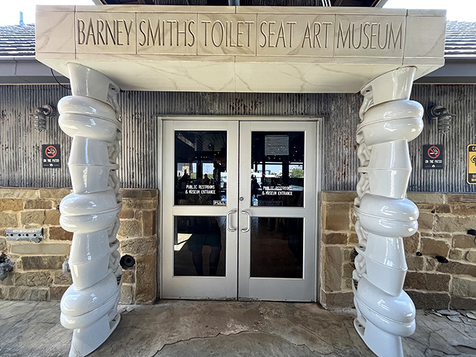 Talk about a grand entrance! These twisted toilet seat columns are the perfect gateway to Barney Smith's quirky world of porcelain art.