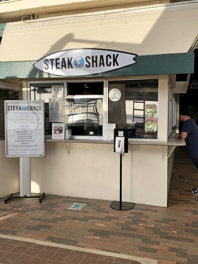 No frills, just thrills! This beachside window is your portal to protein paradise, where steak dreams come true.