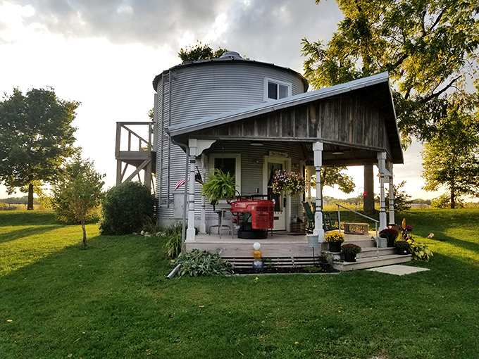 Talk about upcycling! This grain bin went from storing corn to storing dreams. It's the agricultural version of a penthouse suite.