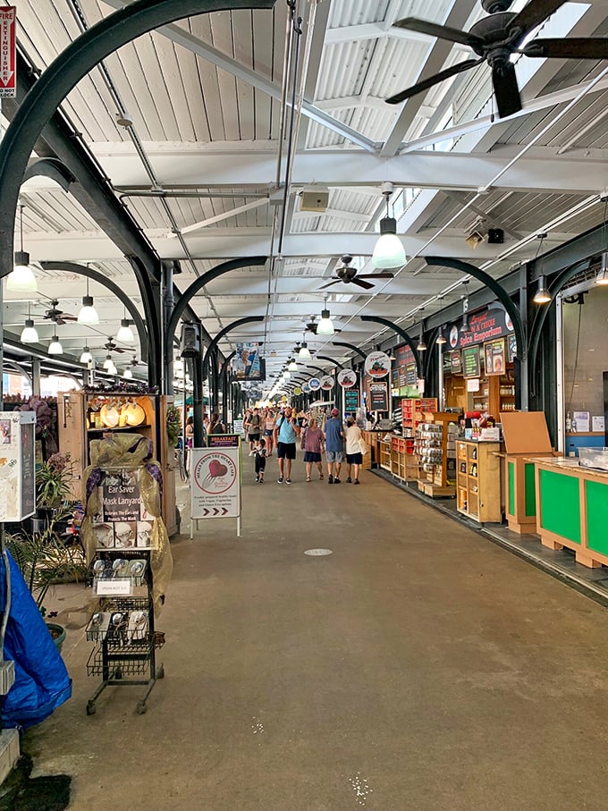 Imagine a covered bazaar stretching as far as the eye can see. Welcome to the French Market's interior, where every aisle promises a new adventure!