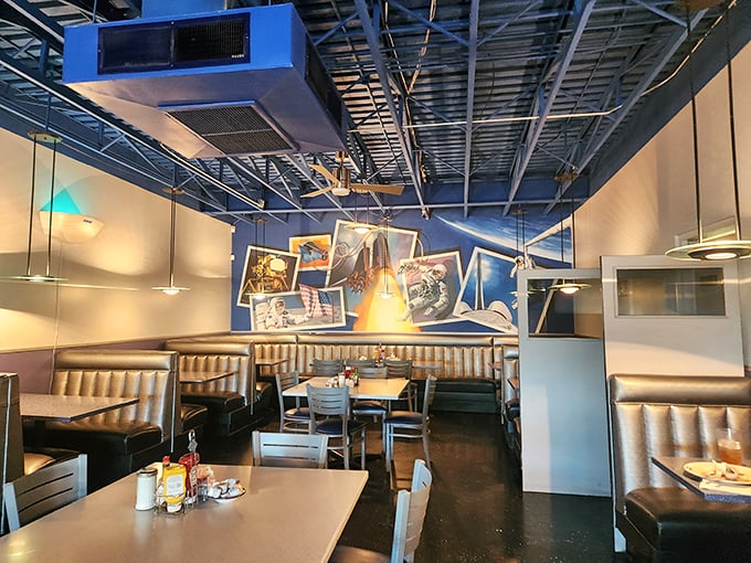 Step inside and prepare for liftoff! The interior of Space Age Restaurant is a cosmic collision of diner charm and space-race chic. Houston, we have a hunger situation!
