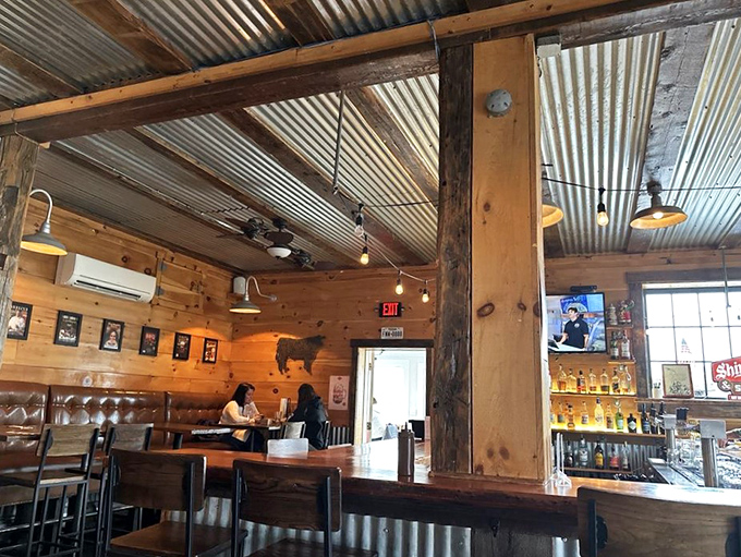 Step inside and feel the Texas vibes! Ore Nell's interior is a cozy blend of corrugated metal, wood, and string lights that'll make you say "yeehaw!"