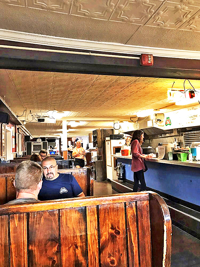 "Step into a time capsule of flavor!" Pat's interior is a cozy blend of retro charm and mouthwatering aromas that'll make you feel right at home.